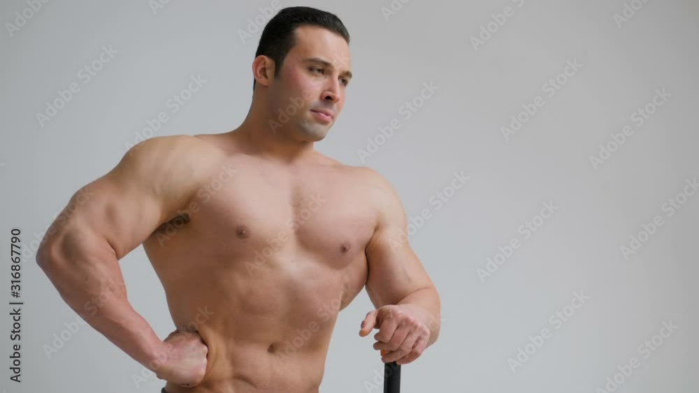 Handsome bodybuilder posing on white background. Fitness muscular body ...