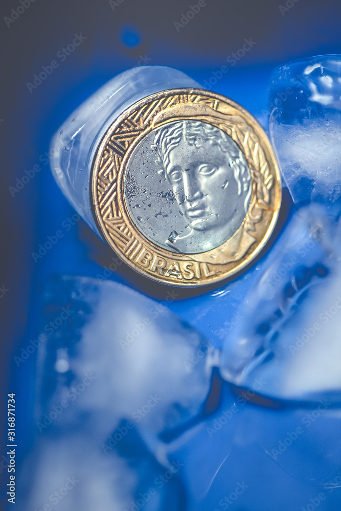 Brazilian coin, Real. Illustration of the devaluation of the Brazilian ...