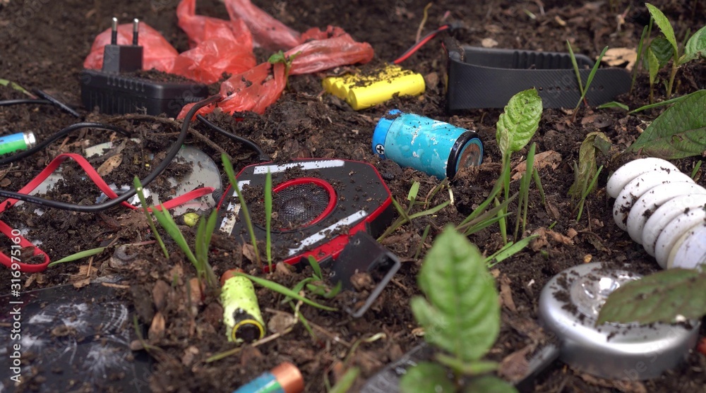 Used electronics in a landfill. Waste Electrical and Electronic ...