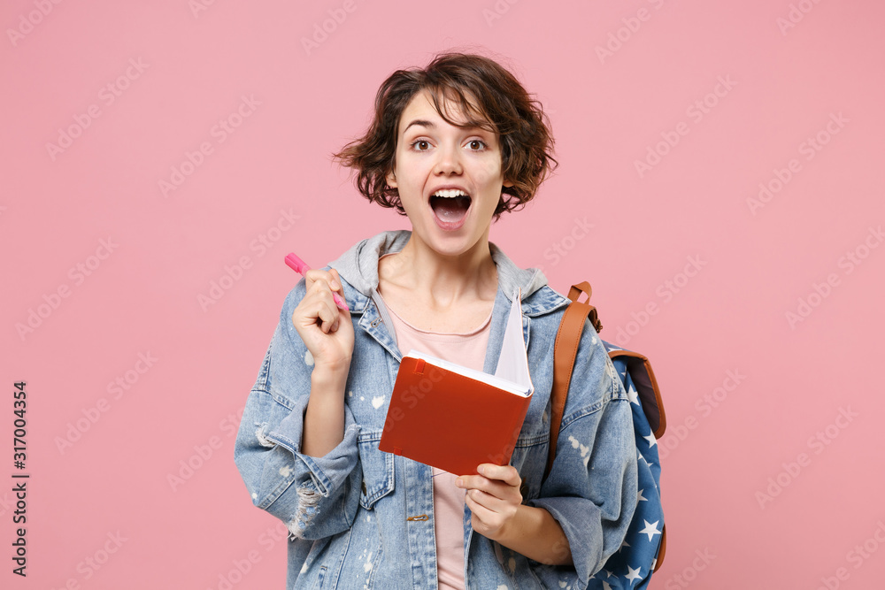 Excited young woman student in denim clothes backpack isolated on ...