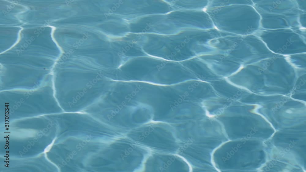 Pattern of blue water surface reflection swimming pool, Ripple wave and ...