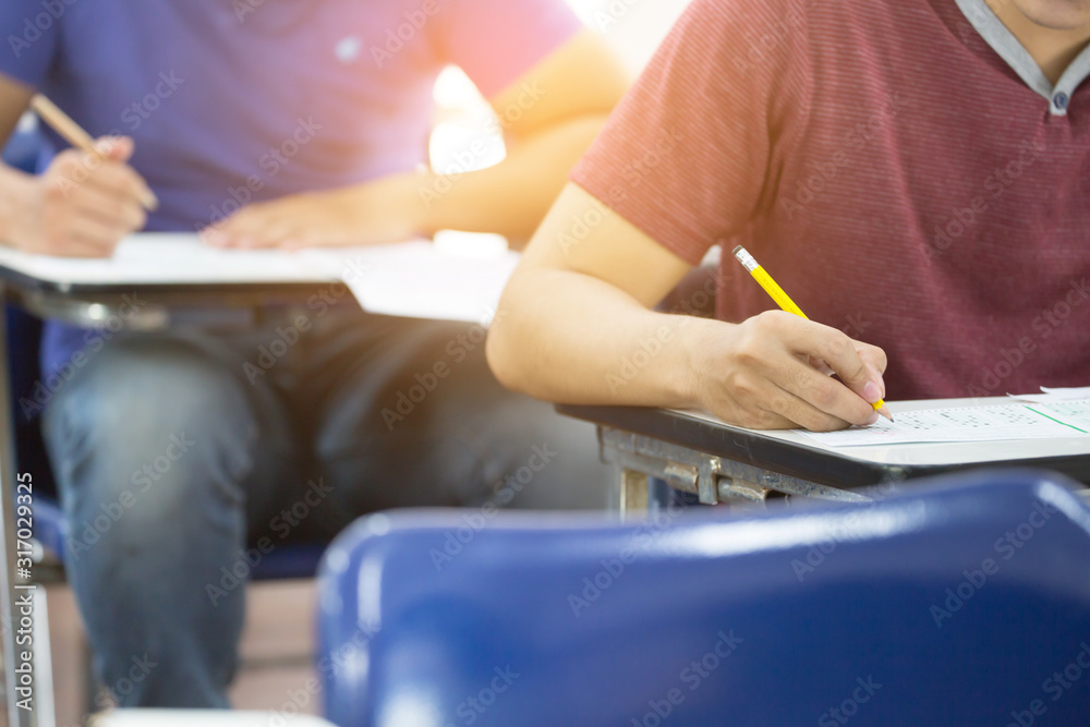high school,university student study.hands holding pencil writing paper ...