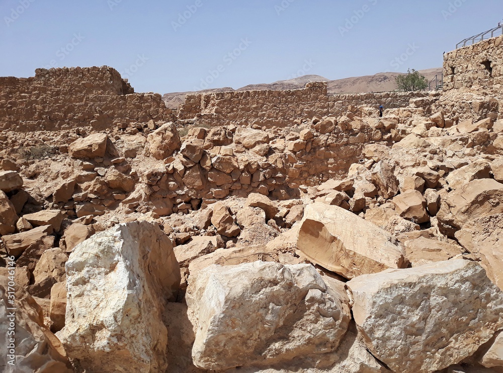 Ruins of the ancient Masada, a mountaintop fortress, near the Dead Sea ...