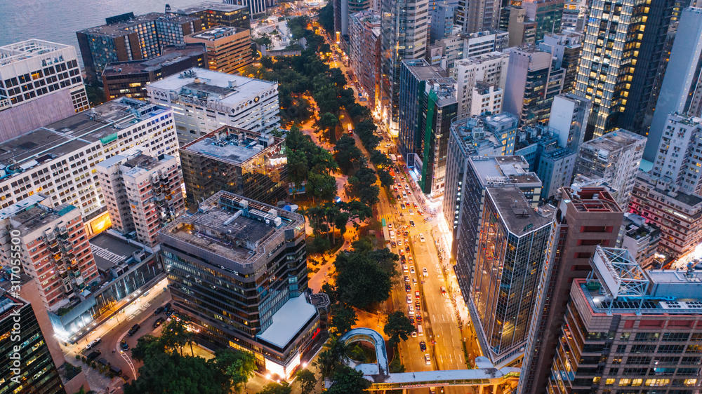 Aerial top view of downtown district buildings in night city light ...