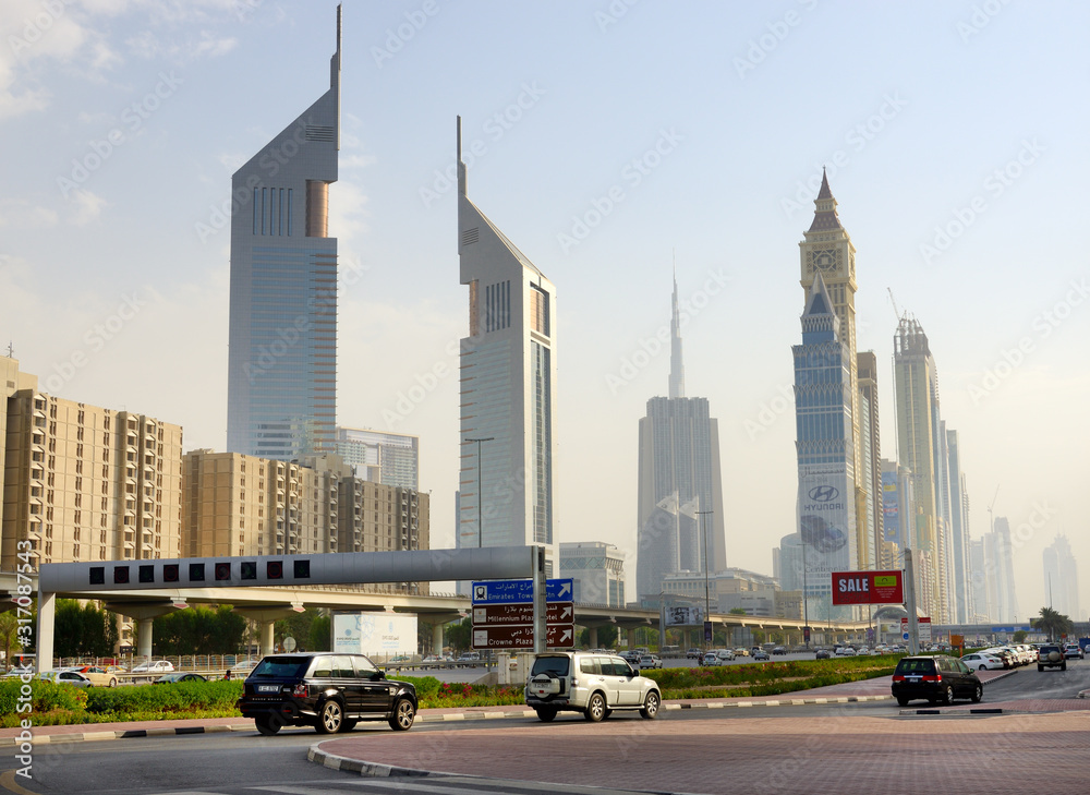 DUBAI, UAE - SEPTEMBER 8: The Dubai cityscape and Emirates towers on ...