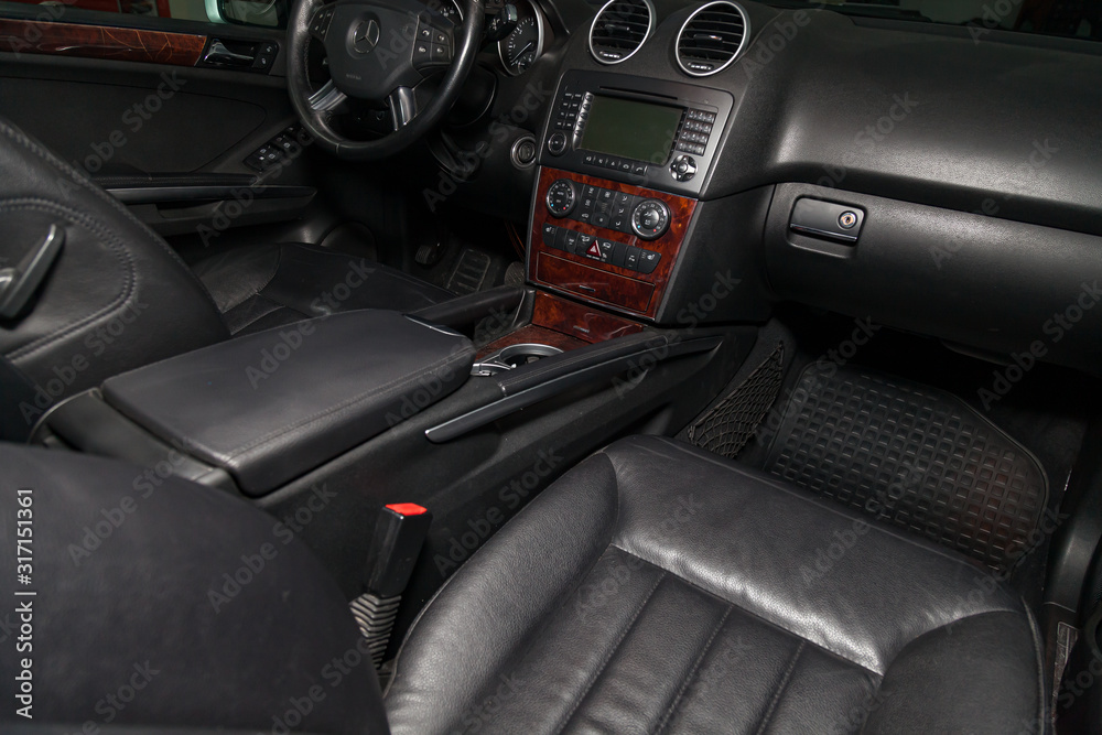 View to black interior of Mercedes Benz ML350 M class with dashboard ...
