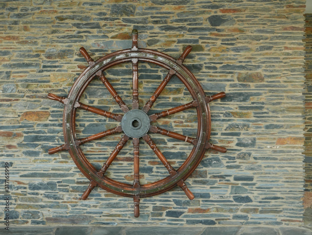 Closeup shot of a wheel on a wall perfect for using as a background ...