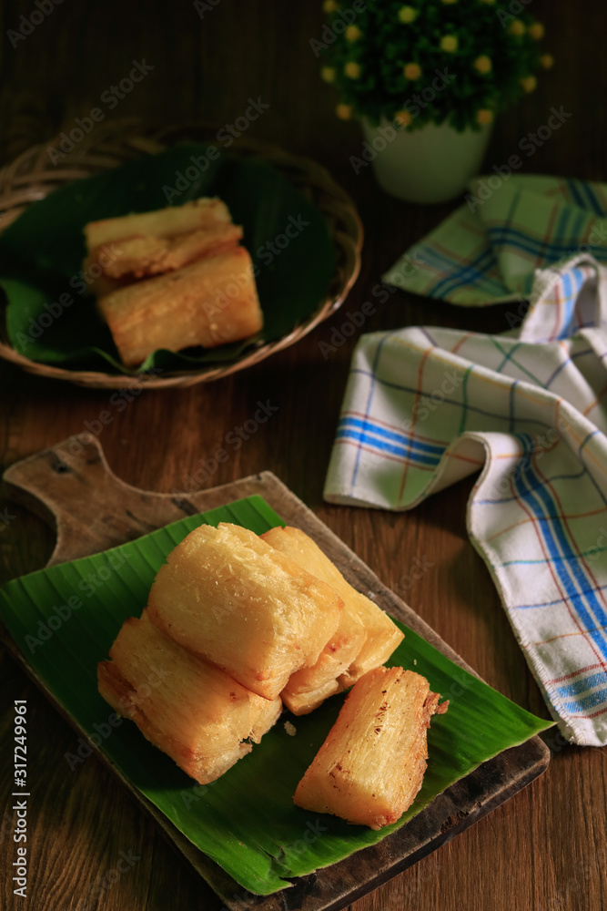 Deep fried cassava root. Brazilian Mandioca Frita (deep fried cassava ...