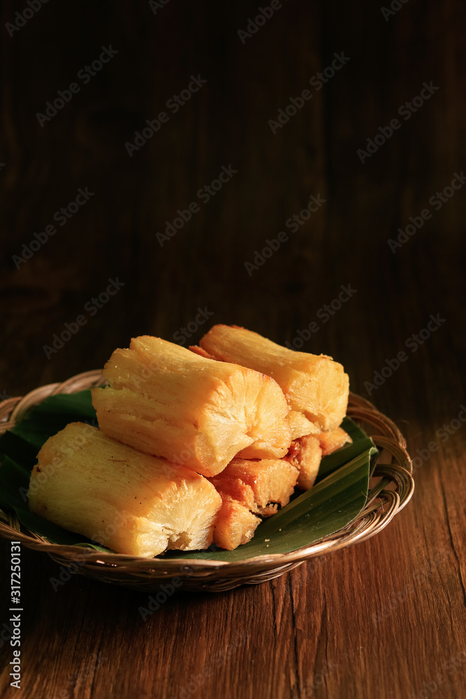 Deep fried cassava root. Brazilian Mandioca Frita (deep fried cassava ...
