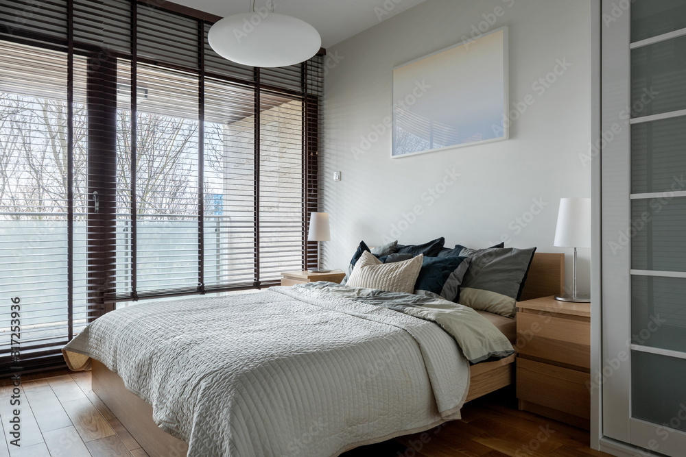 Bedroom with big windows Stock Photo | Adobe Stock