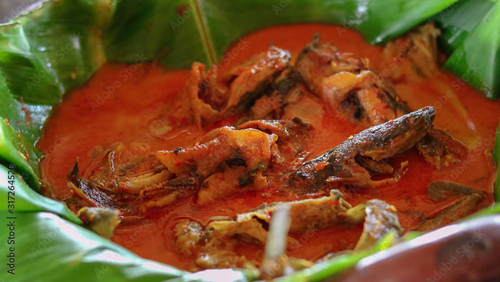 Traditional indonesian culinary food. Mangut Lele, Hot Spicy CatFish ...