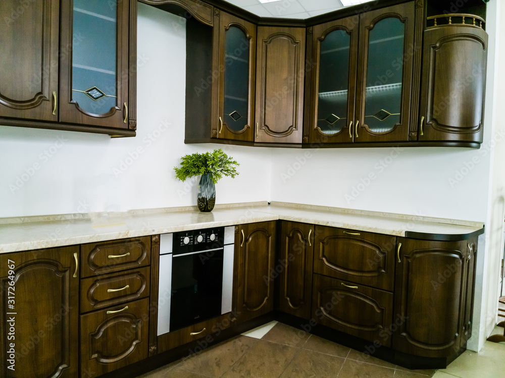 Contemporary modern fully fitted kitchen in brown with top spec ...