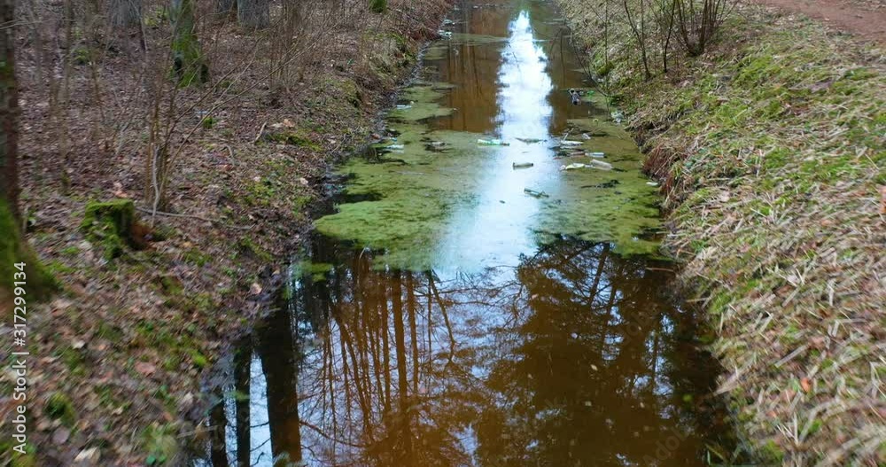 Stockvideo Contaminated water from canalization channels pollutes ...