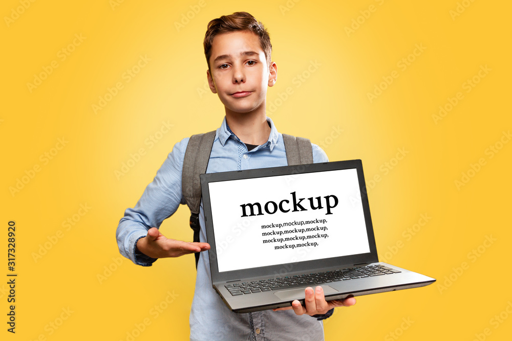 Concept of modern technologies and education. A happy Caucasian teenage ...