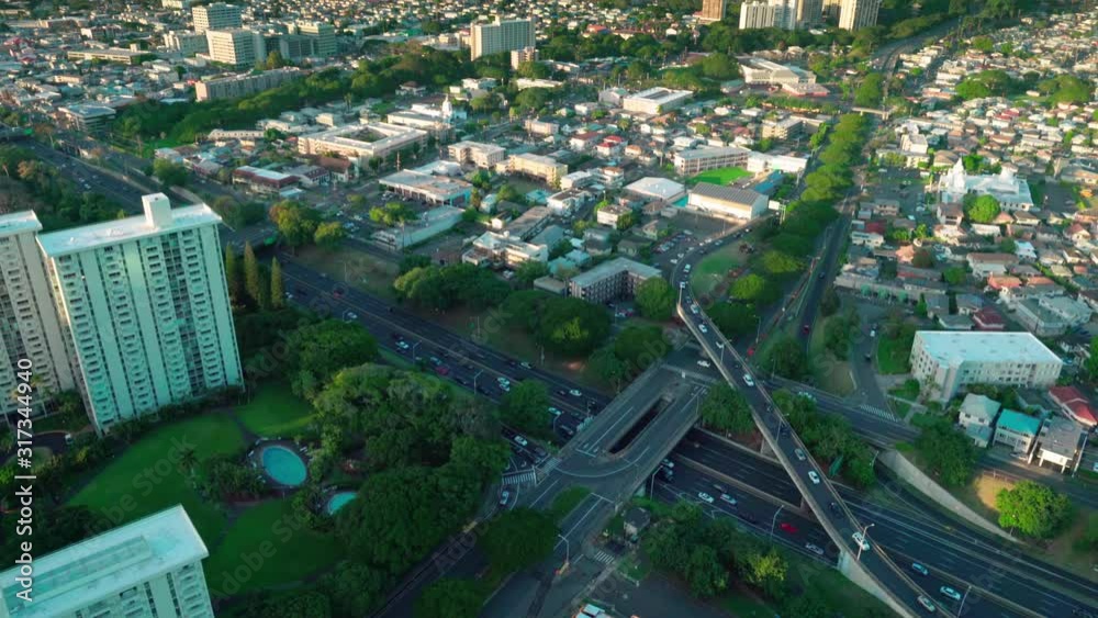 Aerial view of traffic in Honolulu highways. Famous buildings and ...