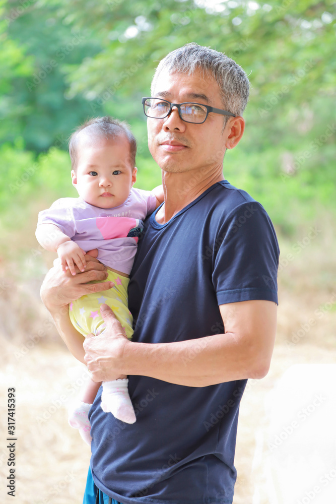 old man and his cute baby, both of them are smiling happily, Use it for ...