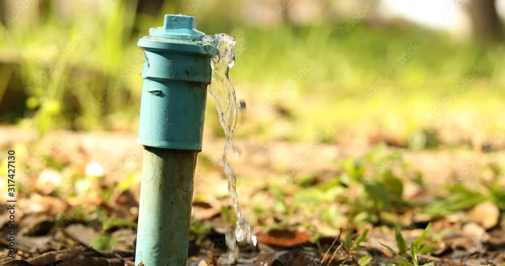 Water is leaking from the PVC pipe.Wasting water,Global warming Stock ...