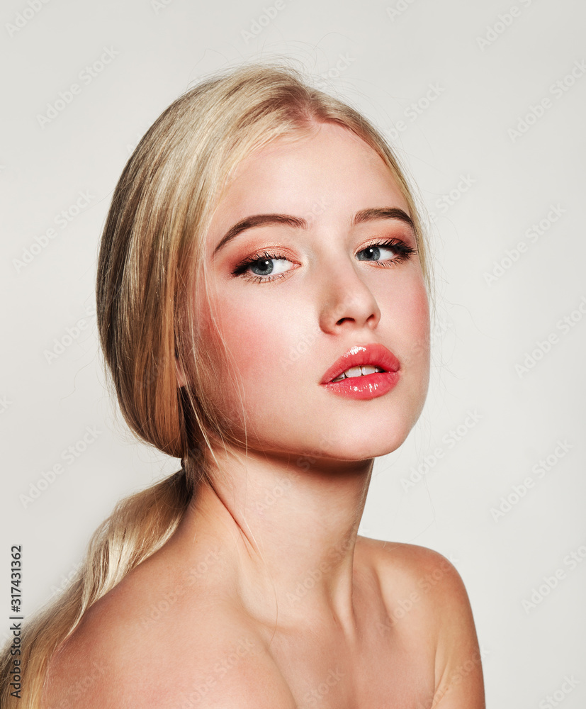 Portrait of beautiful blonde young woman face. Spa model girl with ...