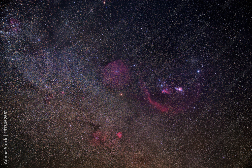 Wide-Field Of Barnard's Loop And Orion Nebula in the dark night sky ...