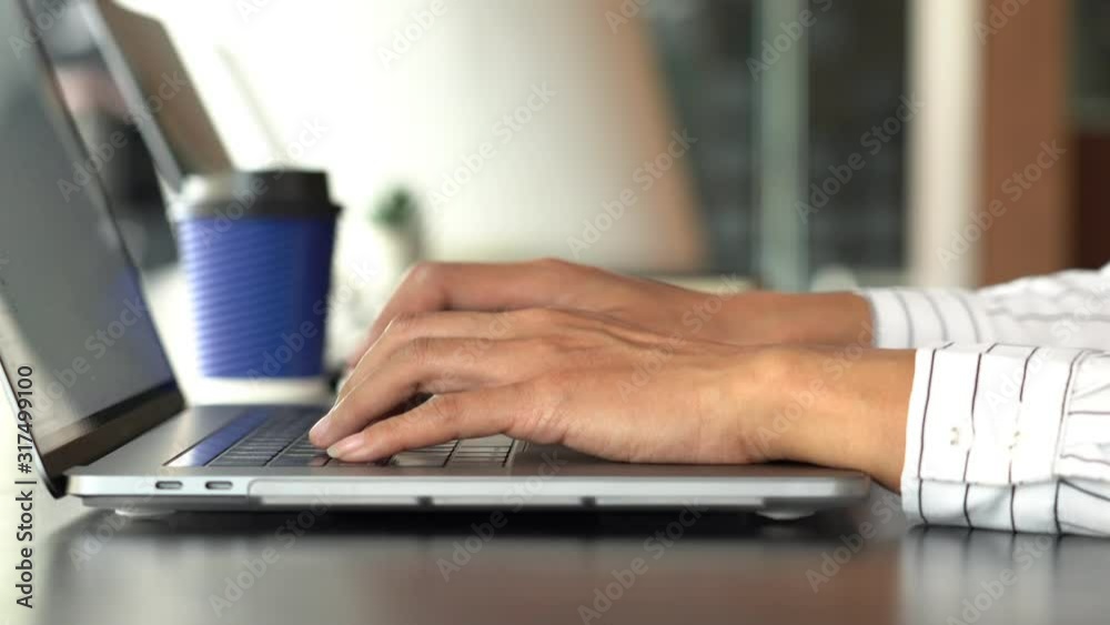 4k video of hands of men who typing laptop keyboard sitting at desk and ...