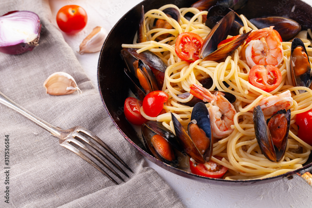 Seafood pasta. Spaghetti with mussels and tiger prawns, traditional ...