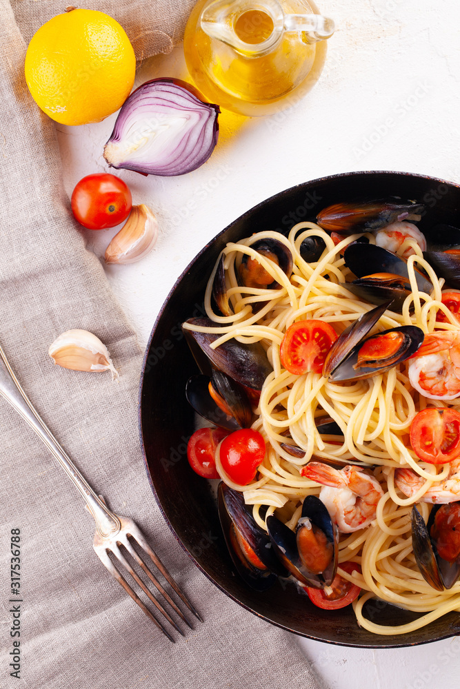 Seafood pasta. Spaghetti with mussels and tiger prawns, traditional ...
