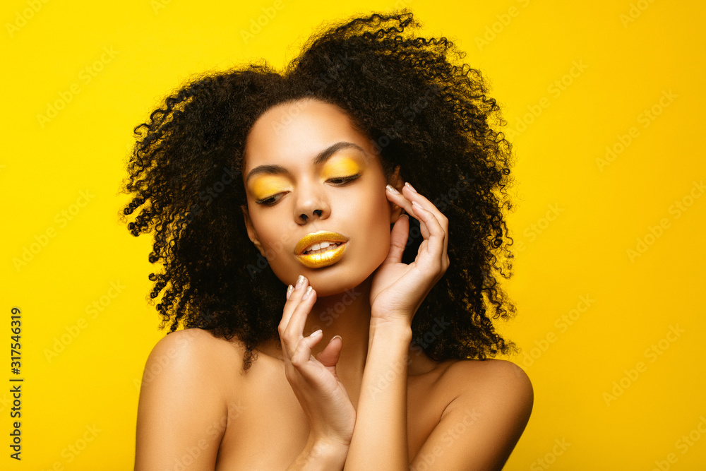 Yellow make up. African American Model portrait . Brunette young woman ...