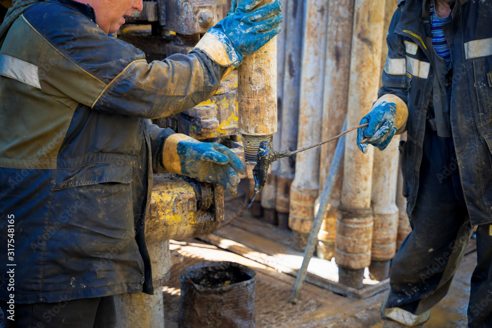 Offshore oil rig worker prepare tool and equipment for perforation oil ...