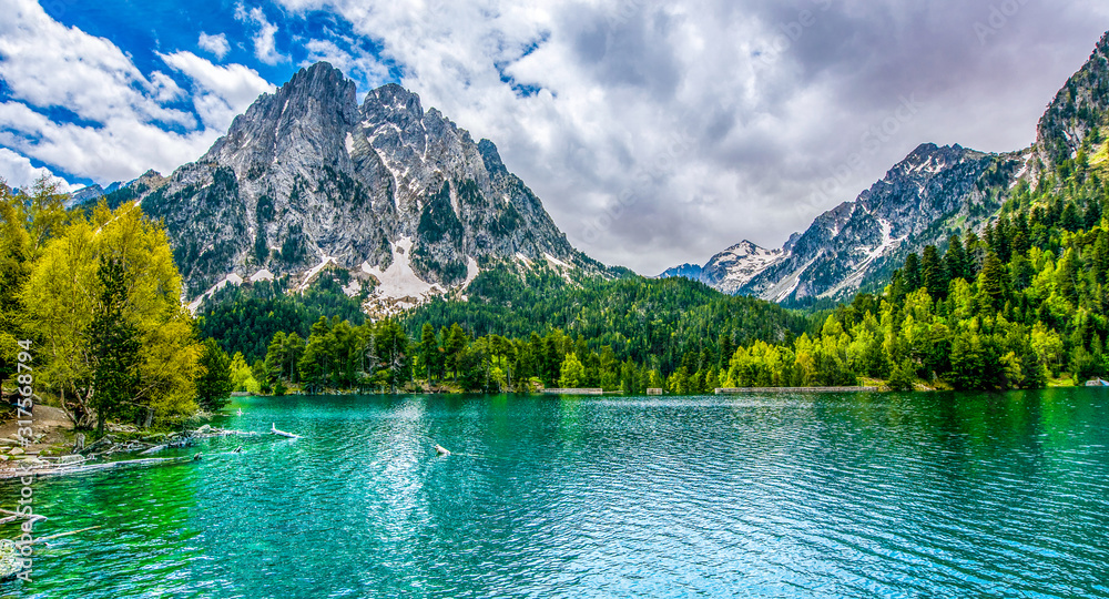 Alpine lake of San Mauricio in the Aigues Tortes National Park in the ...
