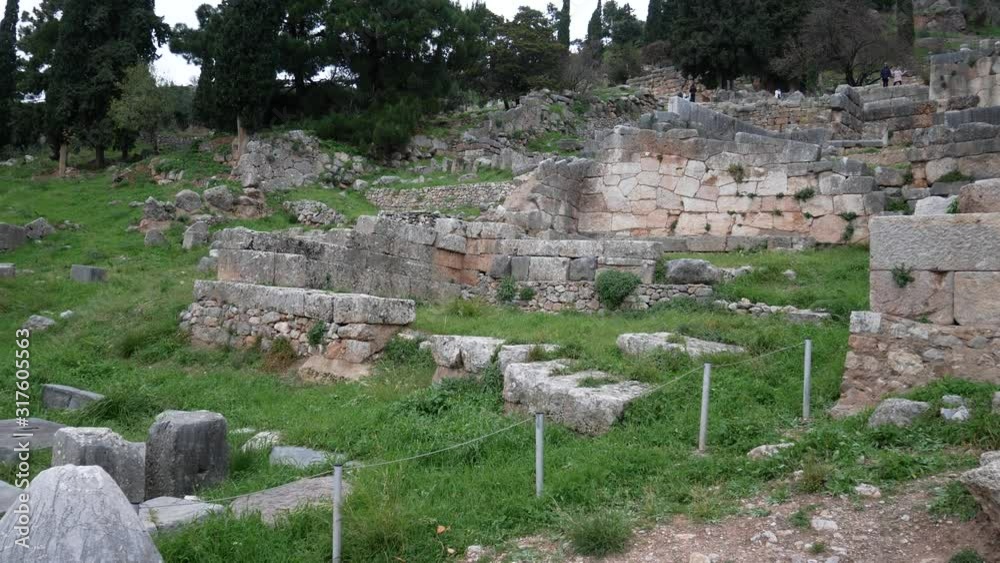 The omphalos stone, navel of the World, archaeological site of Delphi ...