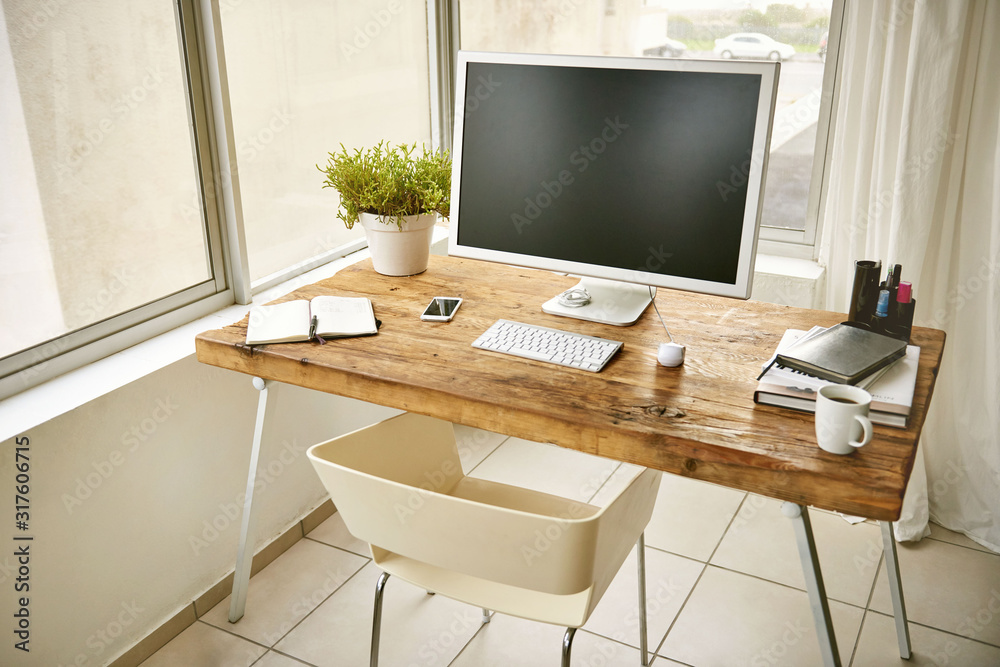 Neat and modern work station with computer and tech ready Stock Photo ...