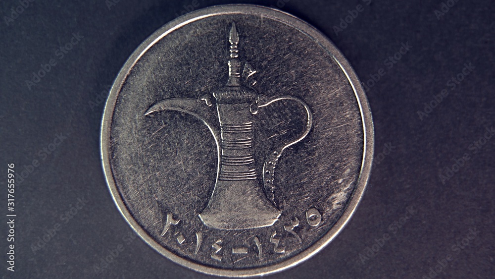 One UAE dirham isolated on black background, macro shot of United Arab ...