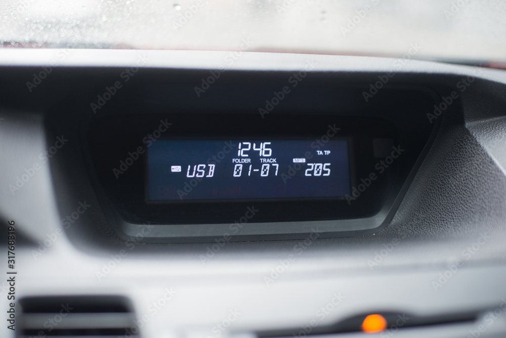 Modern luxury car interior, tv/dvd/audio system with monitor and climat ...