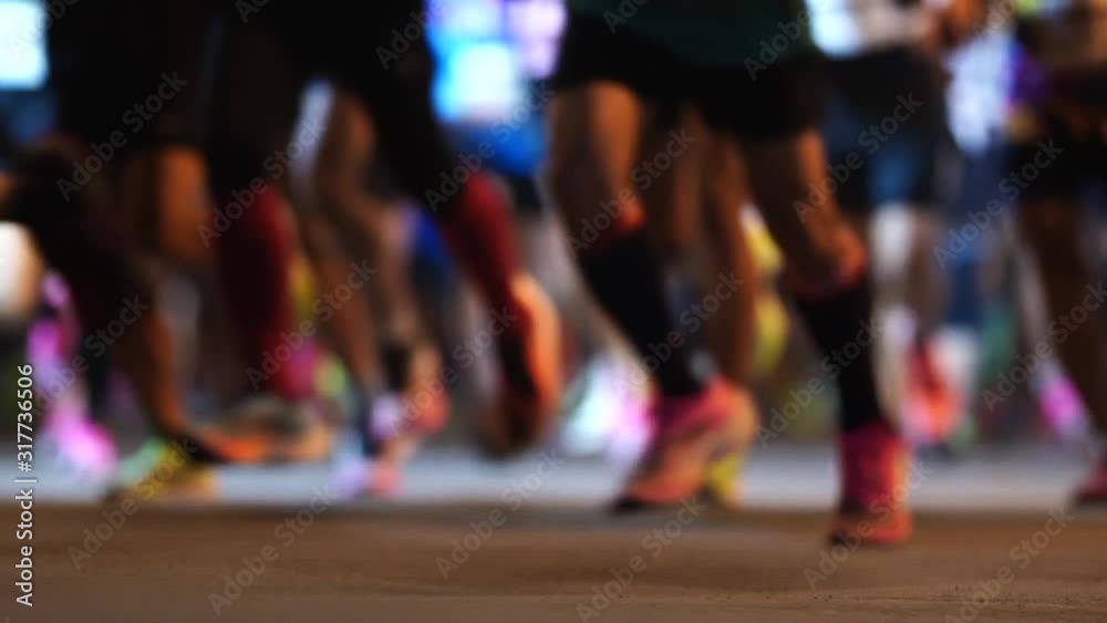 The blur moving of runners at starting point of marathon running in ...