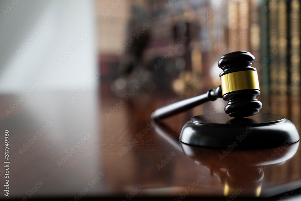 Law and justice theme, judge's gavel on court library background Stock ...
