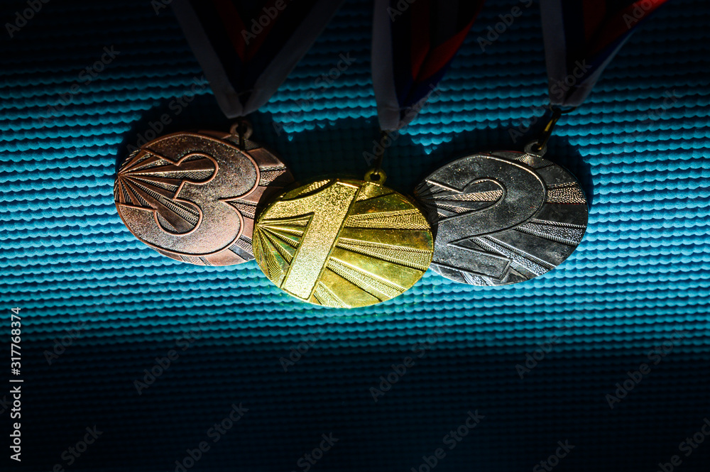 Sport background, gold silver and bronze medal in dark shadow. Original ...