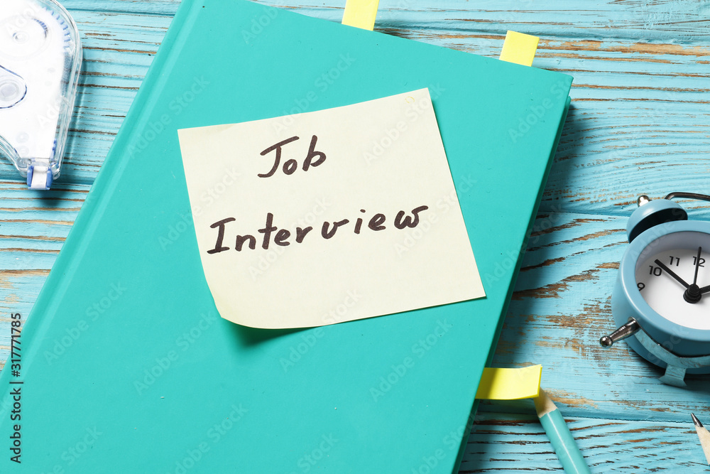 Job interview concept. Composition of notebooks, pens, pencil, stickers ...