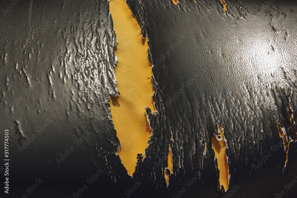 Close up of lack old leather seat .Abstract background of torn old ...