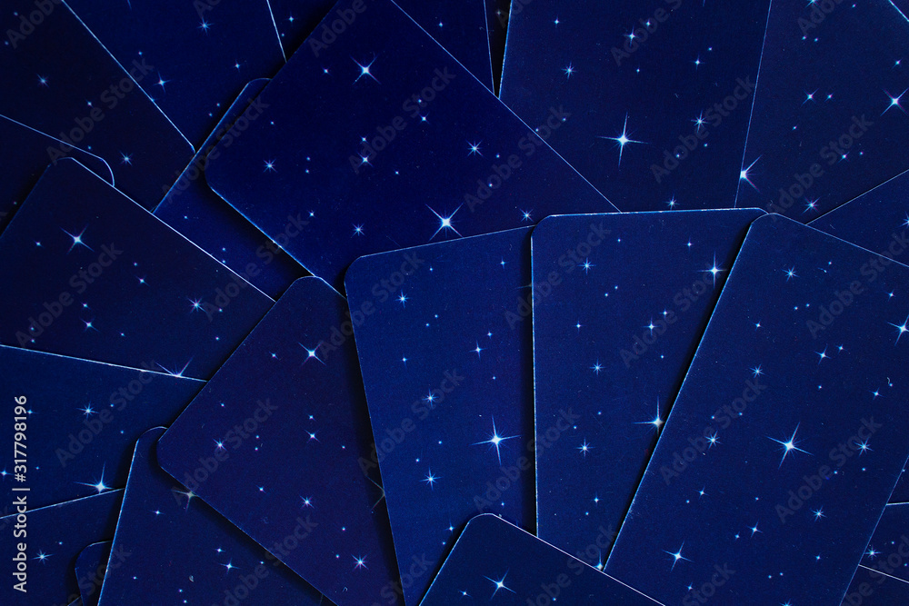 dark blue background with stars tarot reading cards deck Stock Photo ...