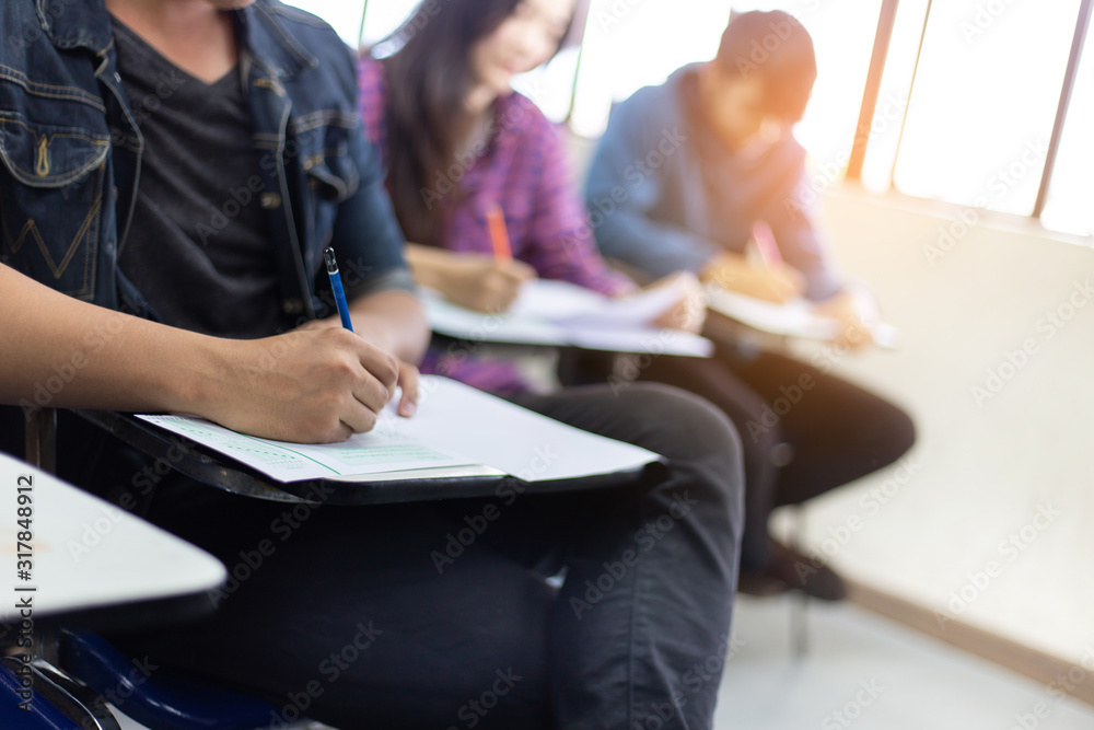high school,university student study.hands holding pencil writing paper ...
