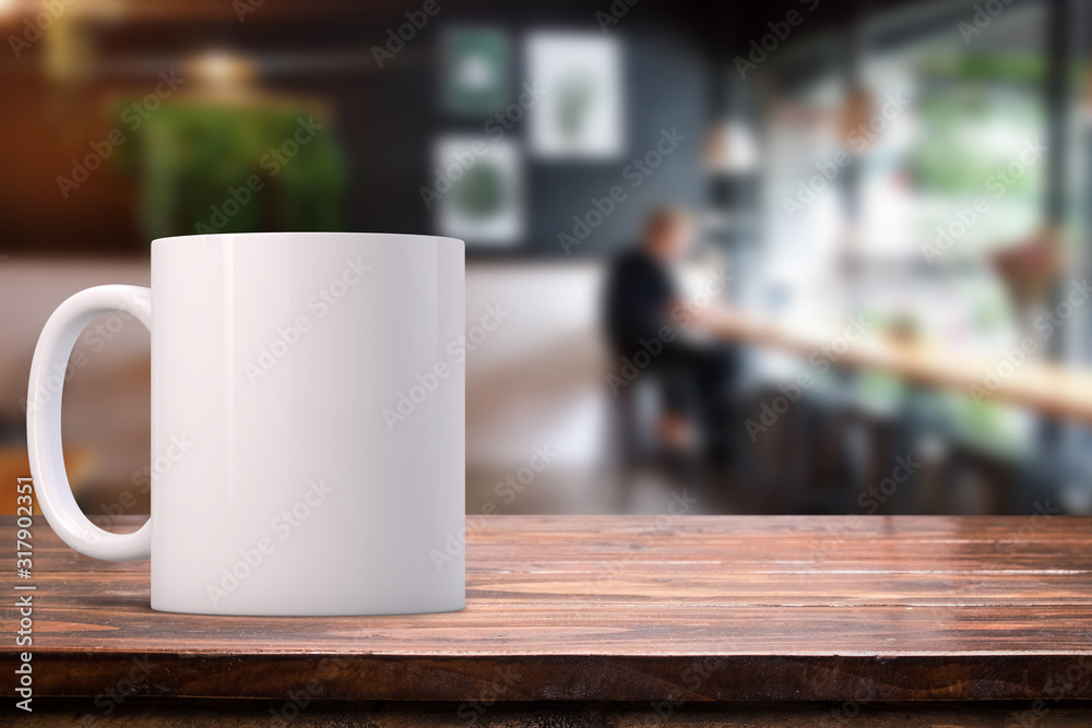 White coffee Mug Mockup set-up in a cafe, with blurred background ...