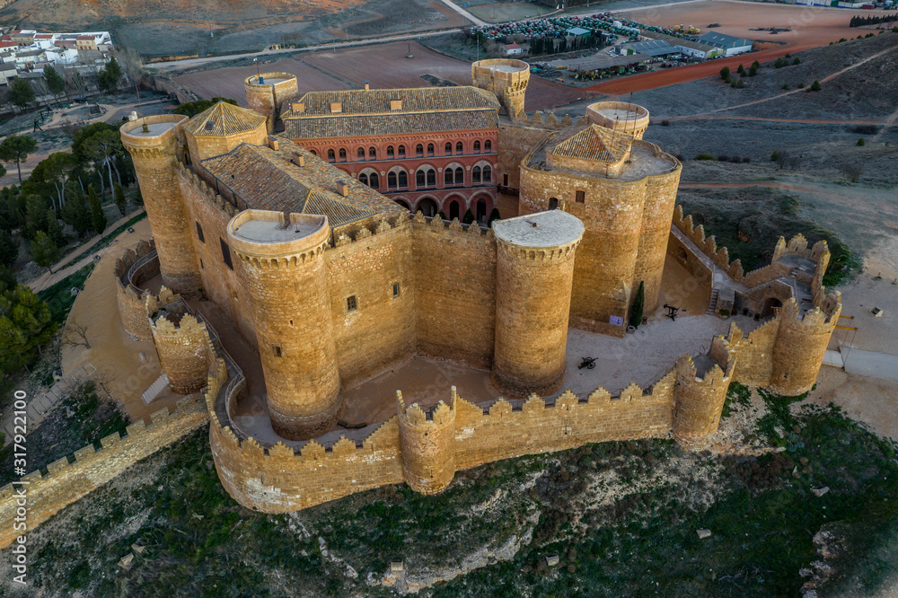Aerial view of Belmonte castle in Cuenca Spain with circular walls, six ...