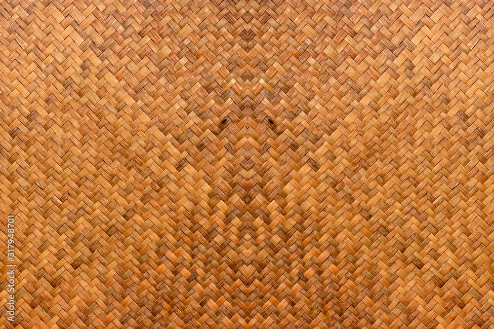 pattern of brown woven reed mat texture background, basketry crafted by ...