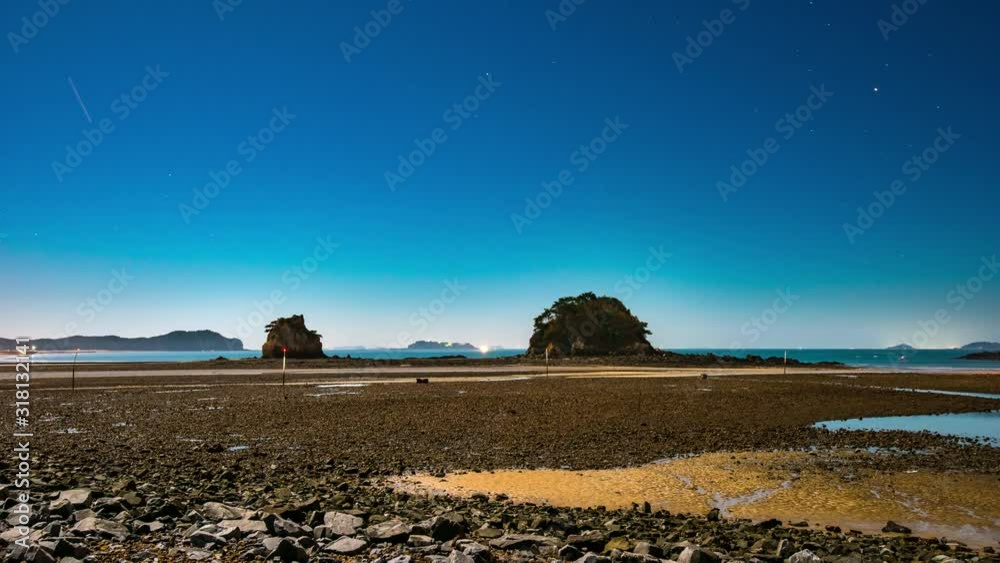 Time Lapse of High Tide and Star Trails by the Beach Stock Video ...