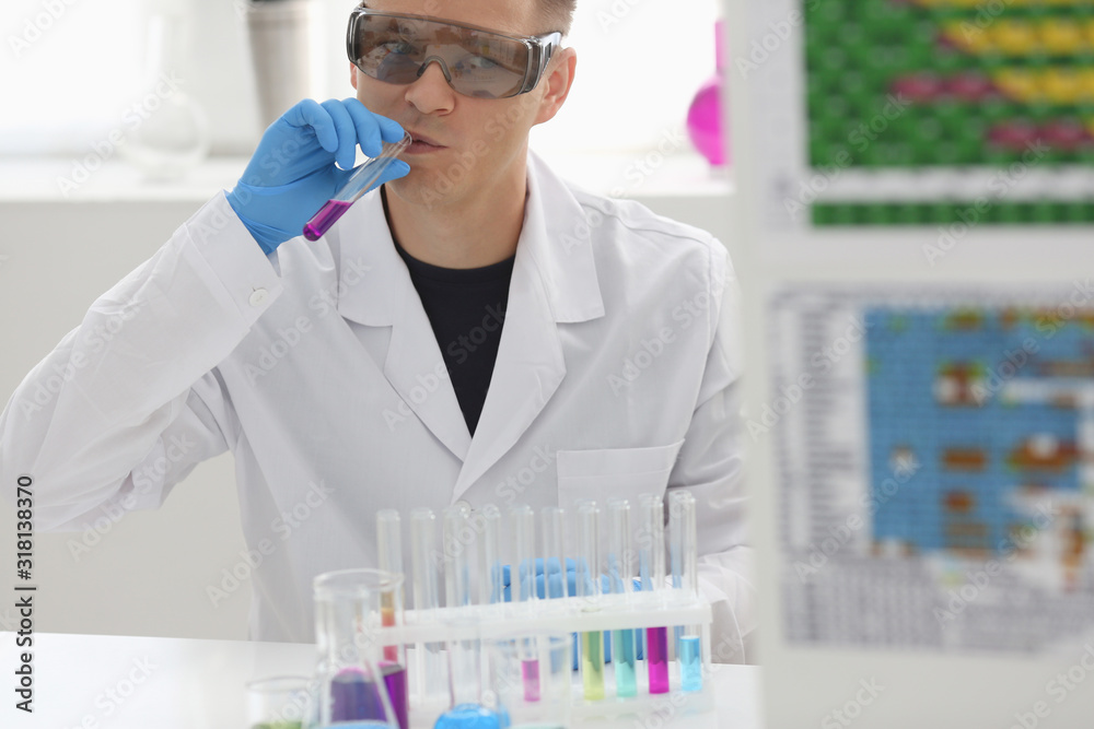 Employee of chemical laboratory teacher chemist tries homemade alcohol ...