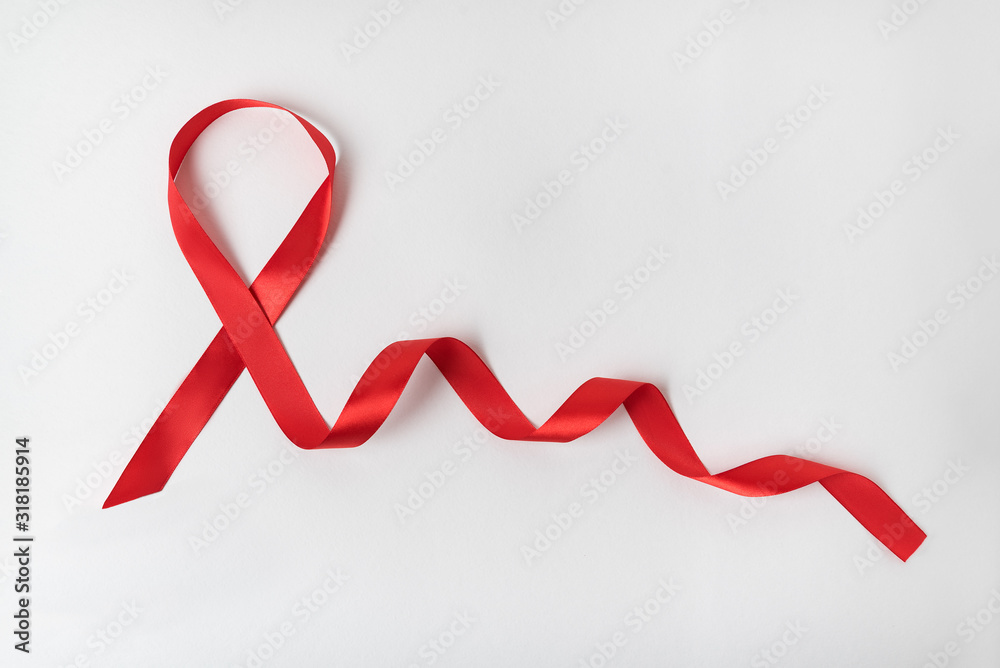 Red ribbon on white background. Aid control symbol. Directly above ...