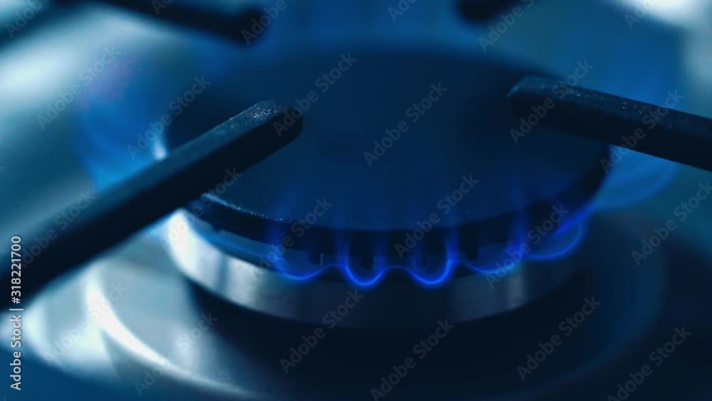 Natural gas kitchen cooker turn on and recently used. Blue and really ...