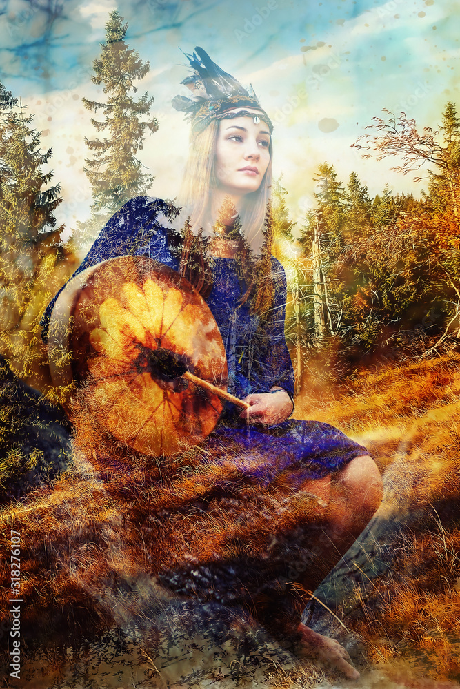 beautiful shamanic girl playing on shaman frame drum in the nature ...