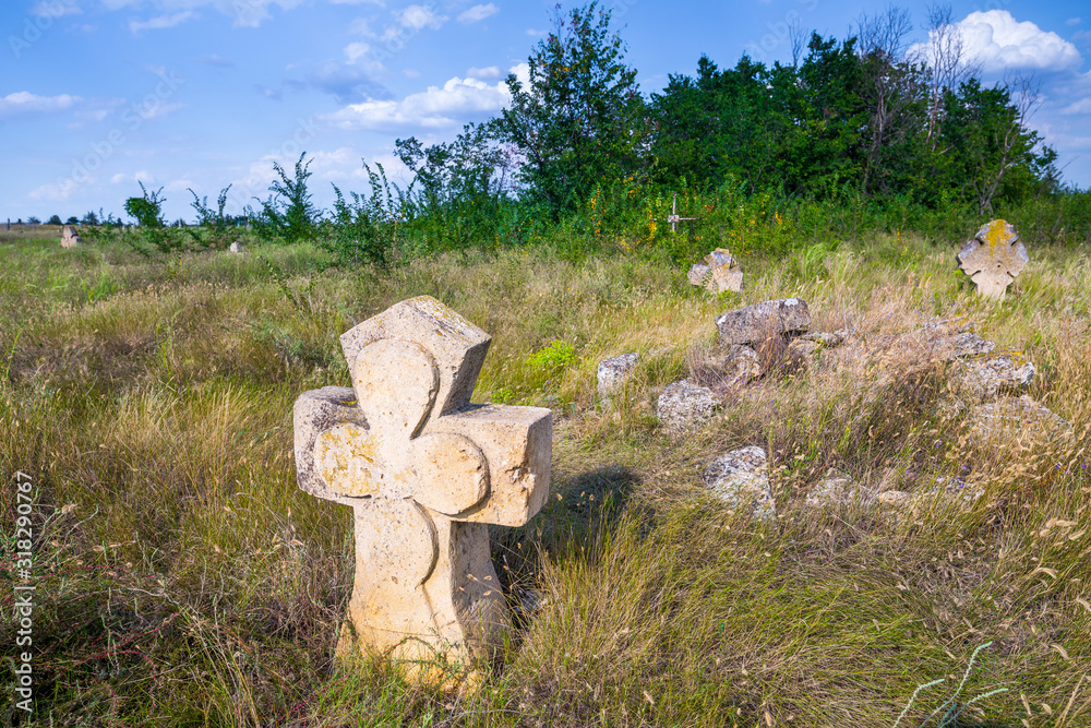 Stone tomb crosses on an ancient Christian necropolis of the 17th-19th ...