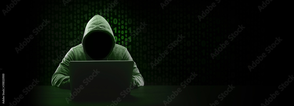 hacker without face in a hood over binary code background, panoramic ...